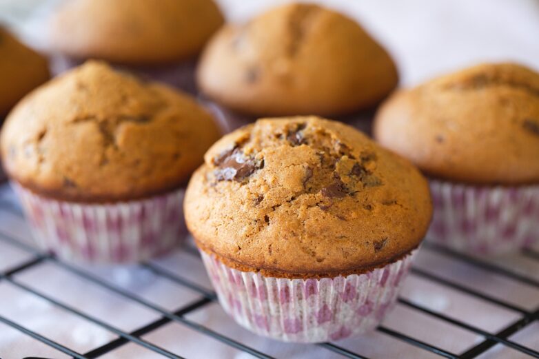 Espresso Chocolate Chunk Muffins with Espresso Cream Glaze - Six Clever ...