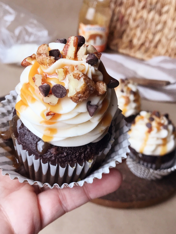 Chocolate Turtle Cupcakes with Caramel Buttercream - Six Clever Sisters